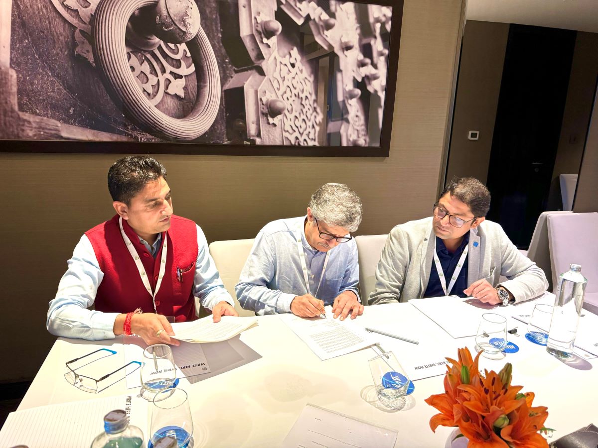 (Left to right) Dr. Yashpal Saharawat, Anand Ron, and Vinay Venkappayya sign an MoU to ...